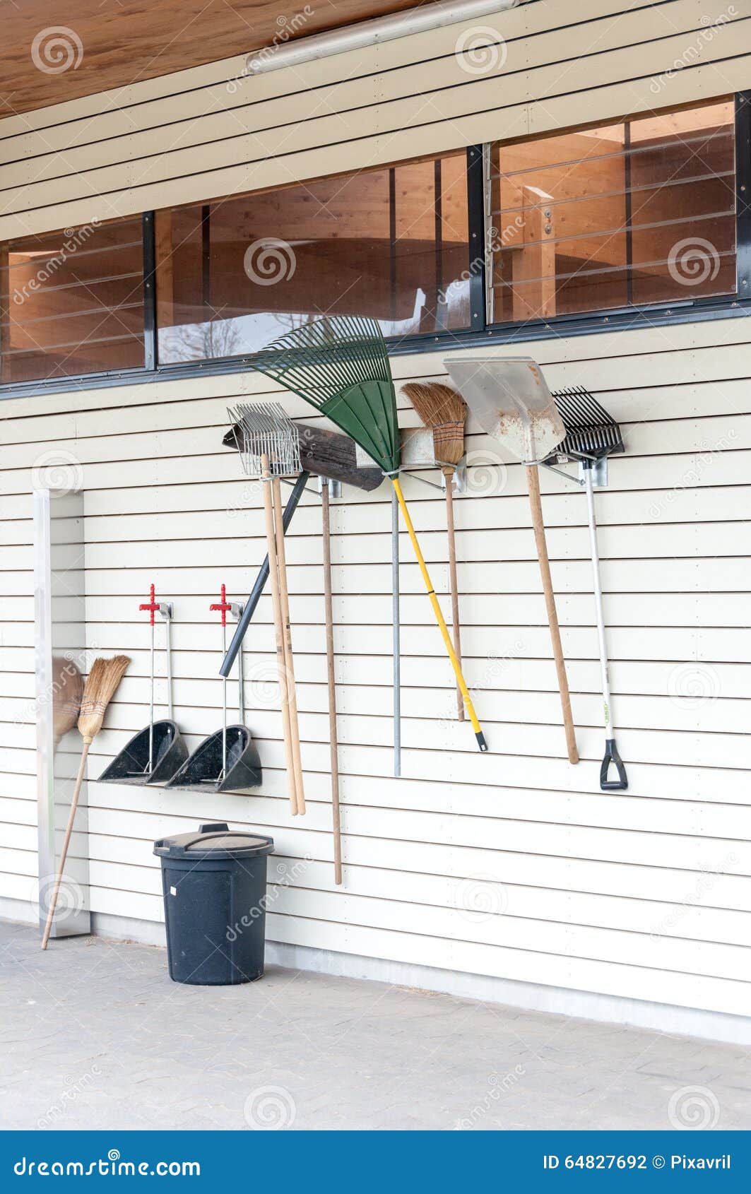 Tools in stable stock photo. Image of green, broom, horse - 64827692