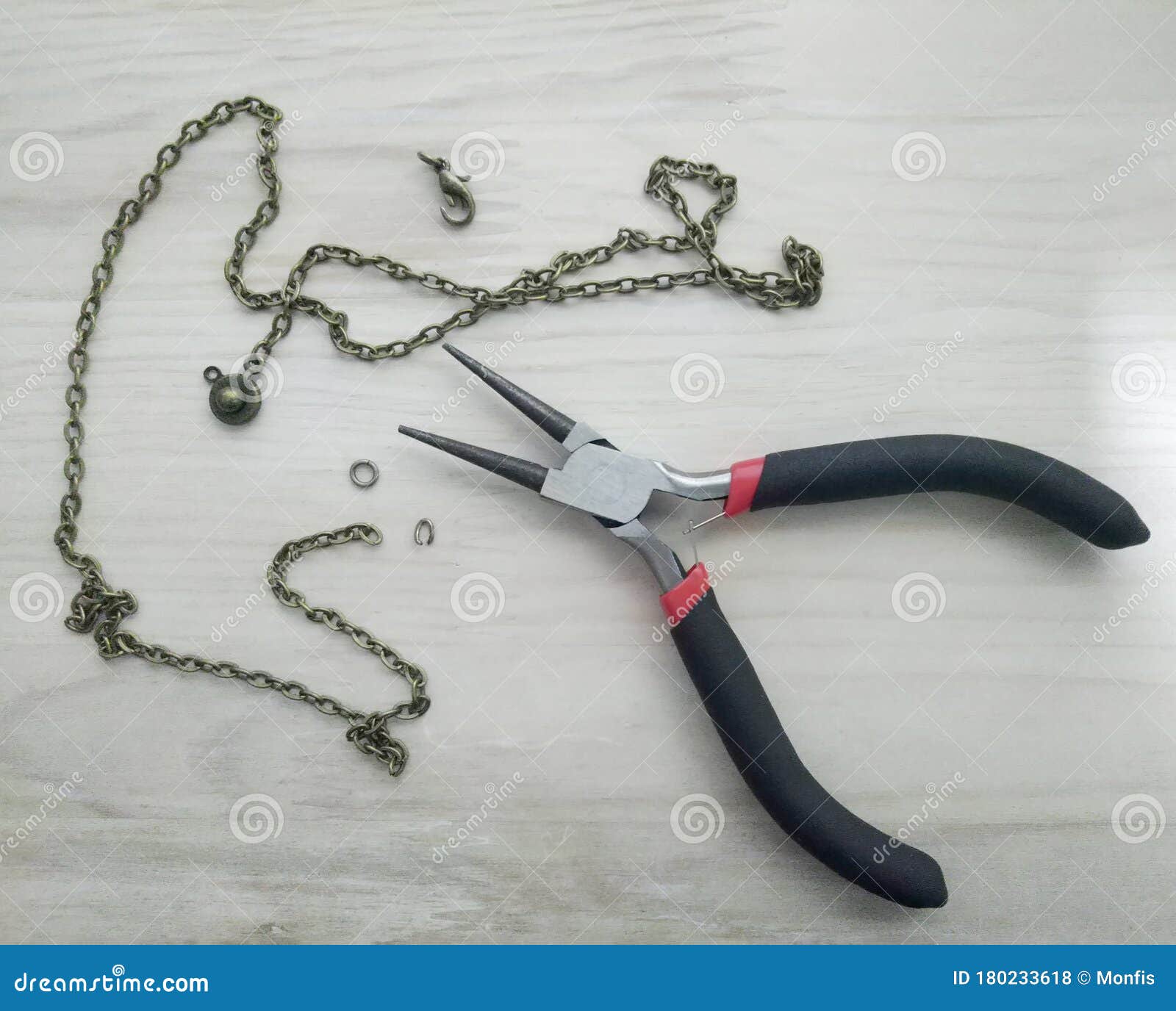 The Tools To Repair the Chain. Broken Bronze Chain and a Mending Tool ...