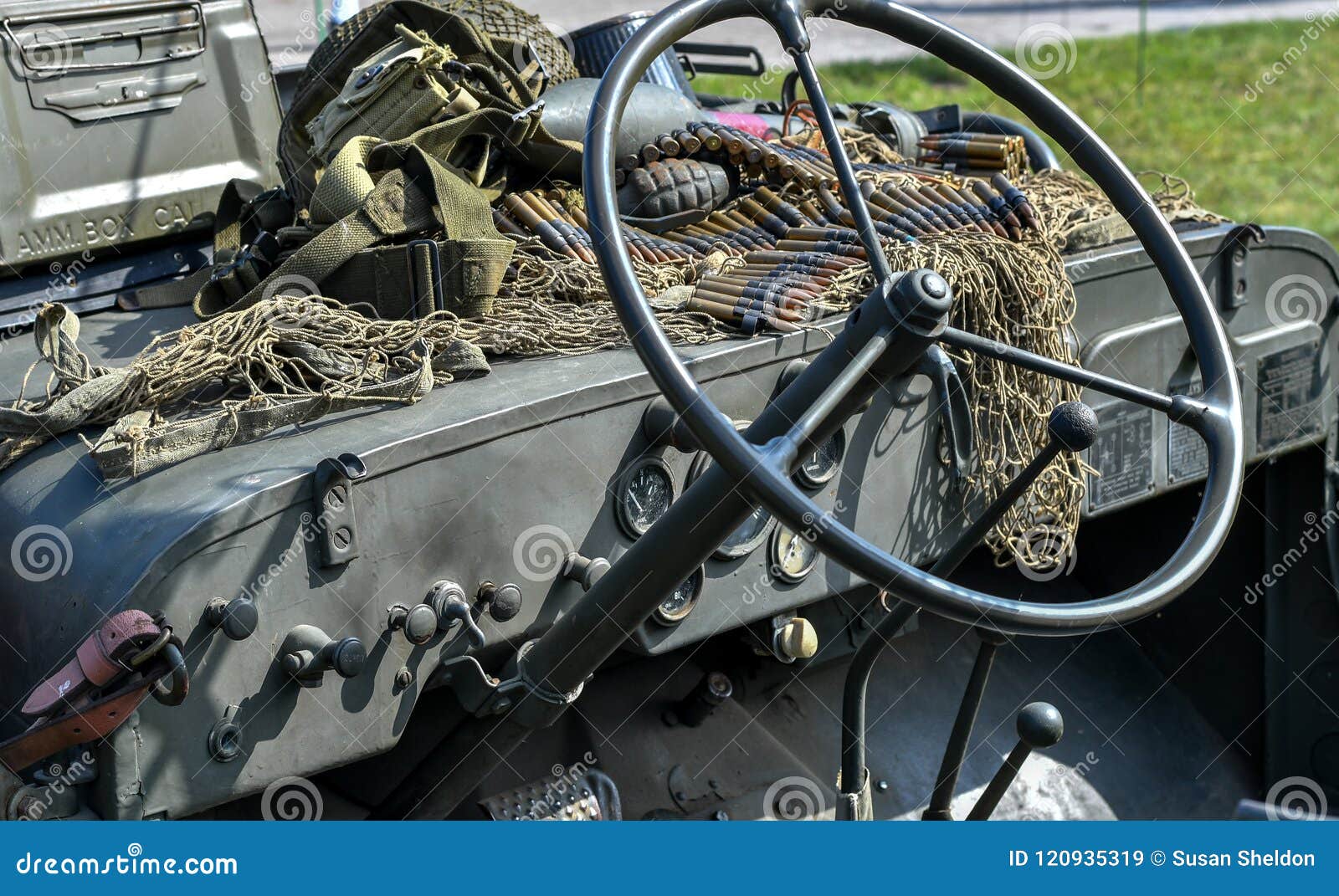 Tools of War and a Military Jeep Stock Image - Image of camoflauge ...