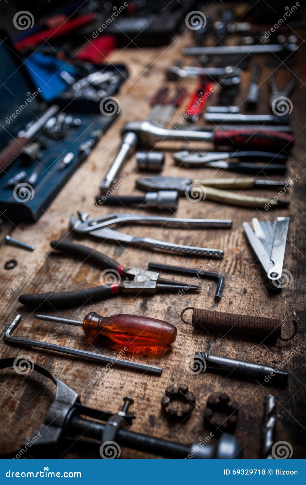 Tools on wooden plank stock photo. Image of equipment - 69329718