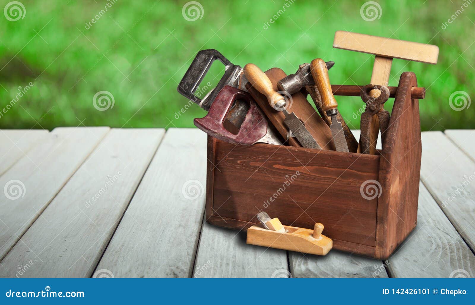 Tools on Wooden Table in the Summer Garden on a Sunny Day Stock Image ...