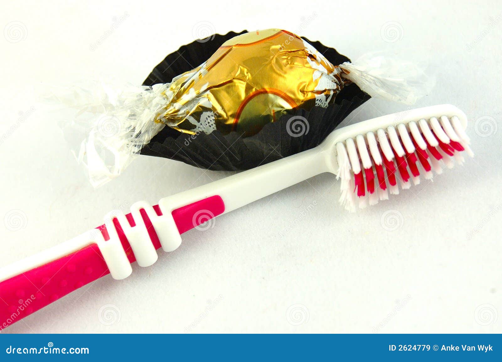 Tooth brush and chocolate stock image. Image of praline - 2624779
