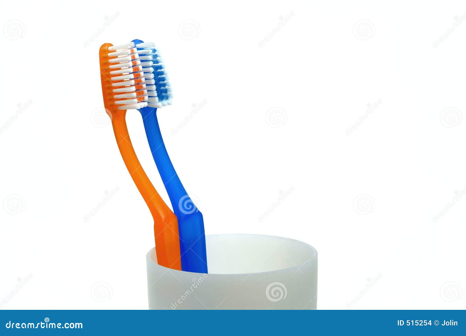 Tooth brushes on cup stock photo. Image of orthodontics - 515254