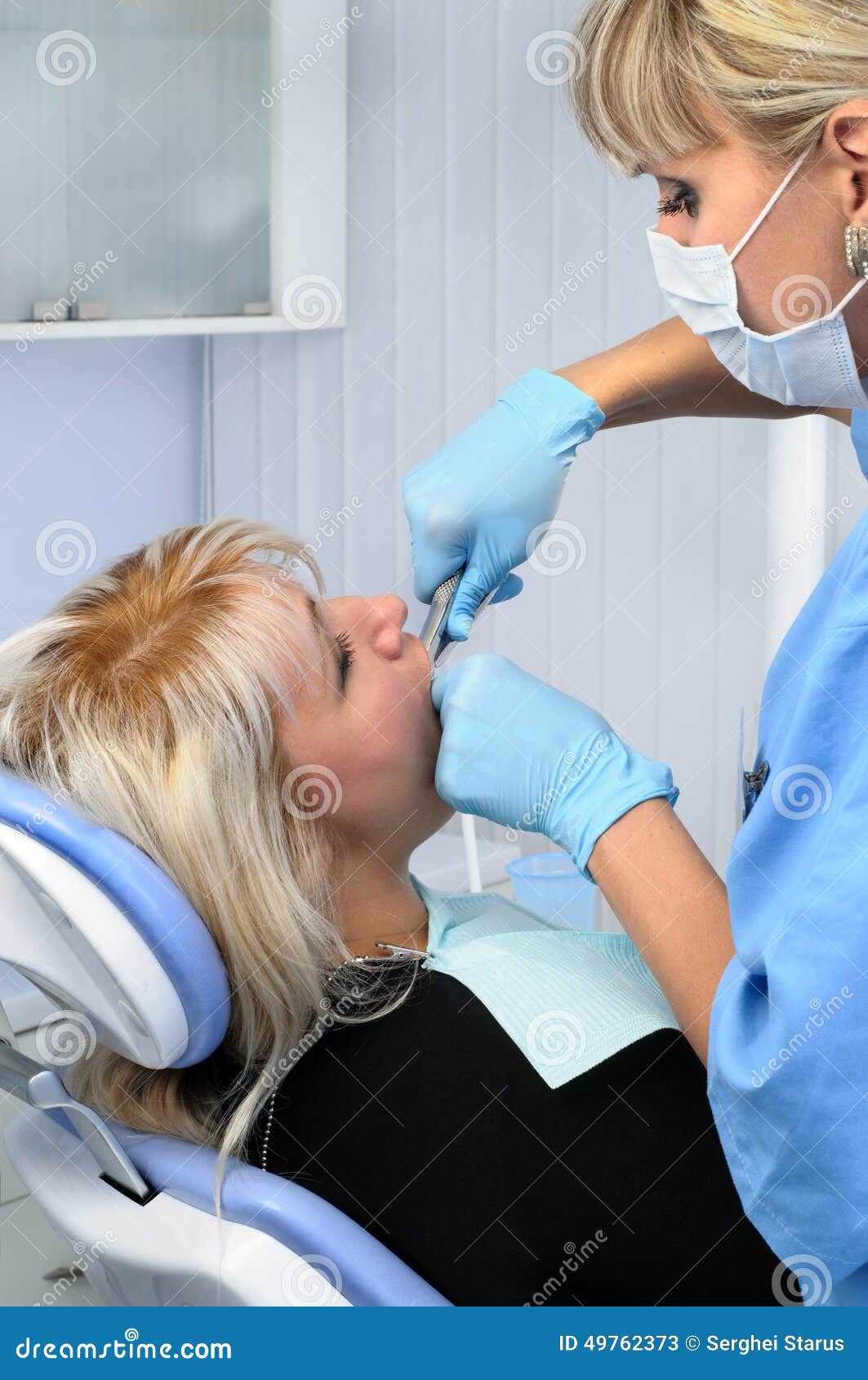 Tooth extraction stock image. Image of doctor, dental - 49762373