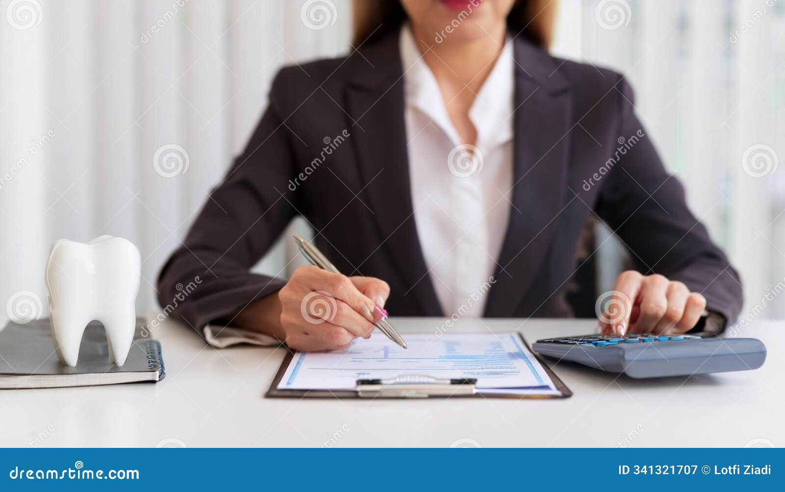Tooth in Front of Businessperson Calculating Bill Stock Image - Image ...