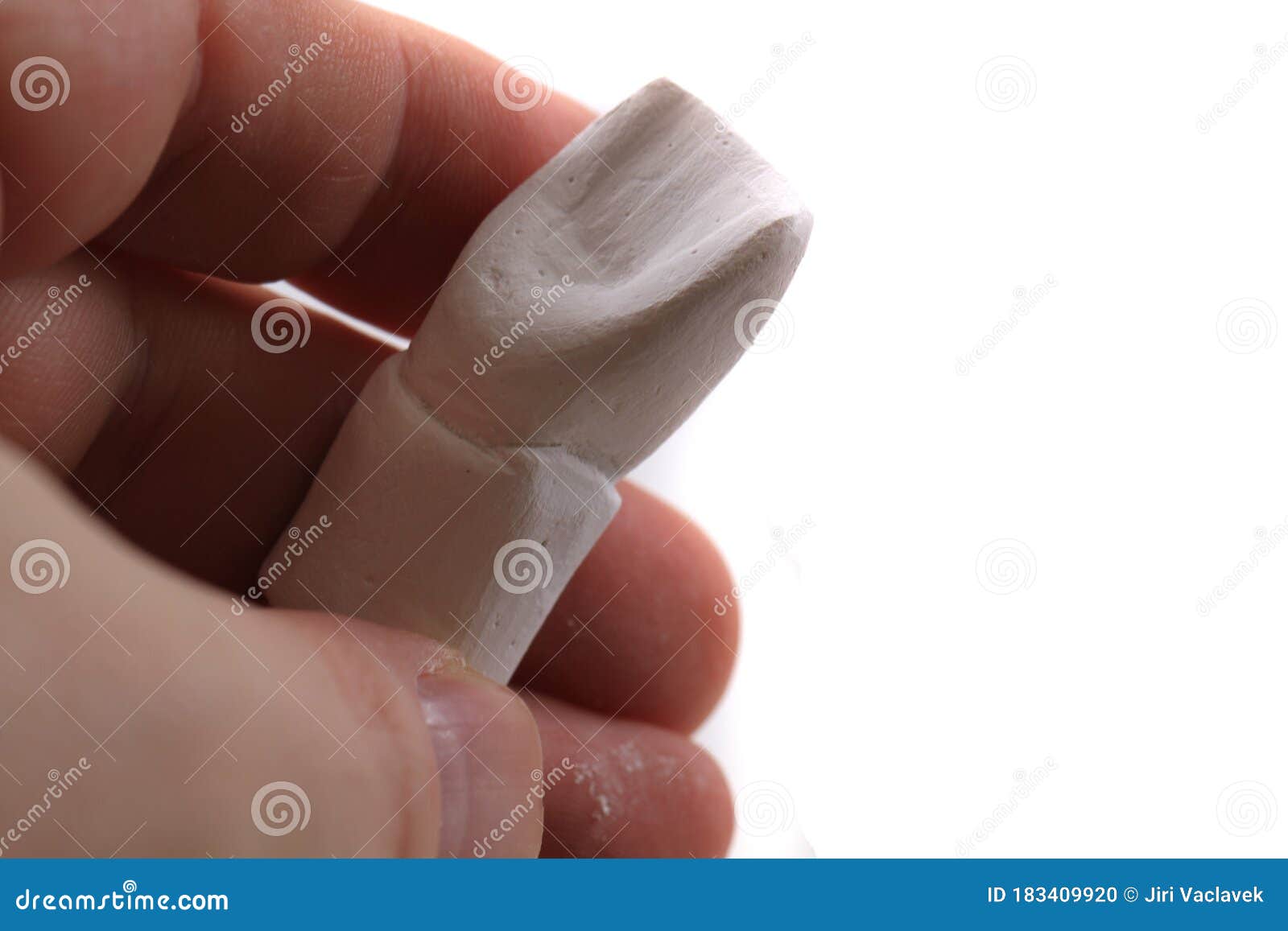 Tooth model in human hand stock photo. Image of isolated - 183409920