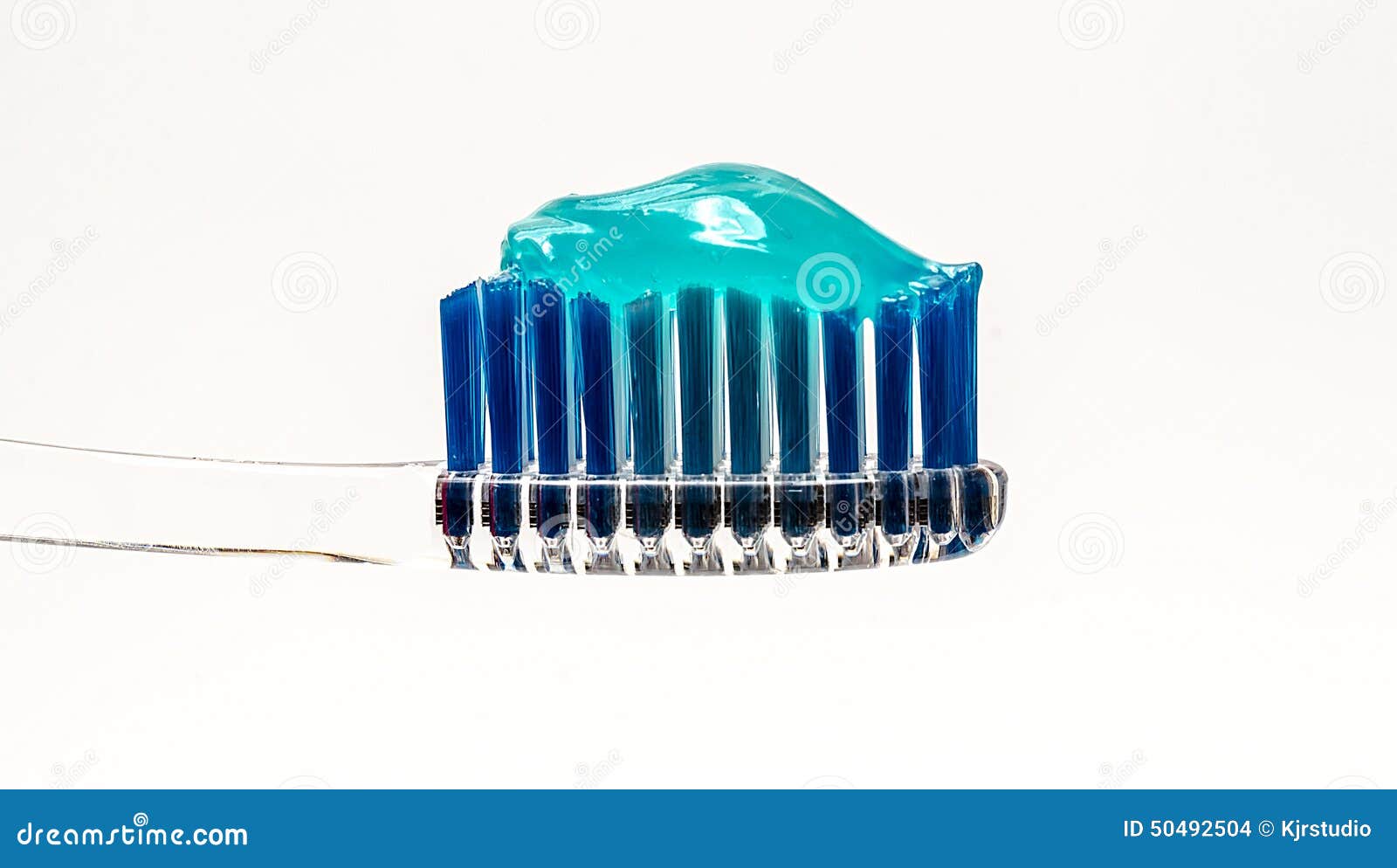 Toothpaste on brush stock photo. Image of dental, fluoride - 50492504