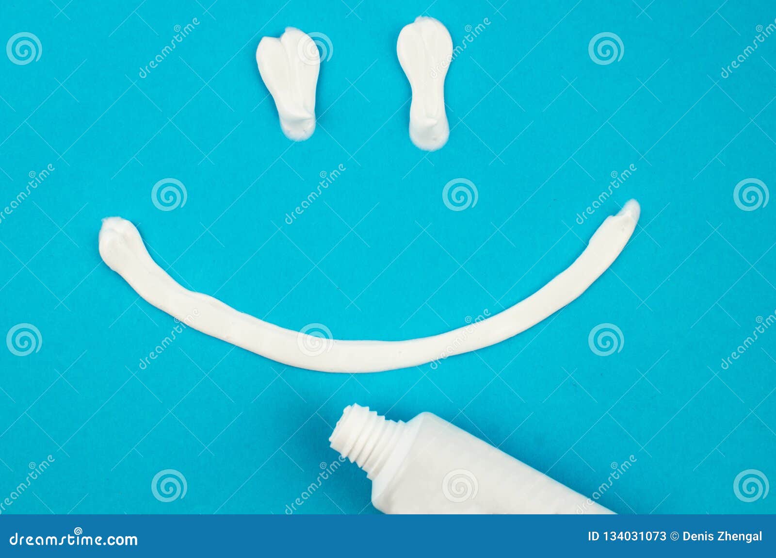 Tooth-paste in the Form of Face with a Smile. Tube of Toothpaste and ...