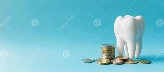 A Tooth with a Stack of Coins Highlighted on a Blue Background. Copying ...
