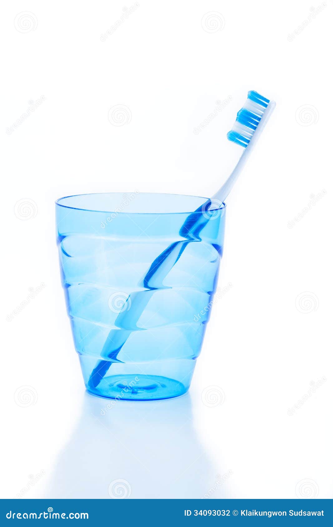 Toothbrush in Blue Plastic Glass Stock Photo - Image of purge, group ...