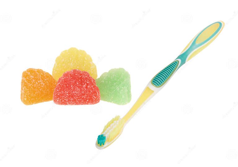 Toothbrush and Candy stock image. Image of dental, sugar - 12854593