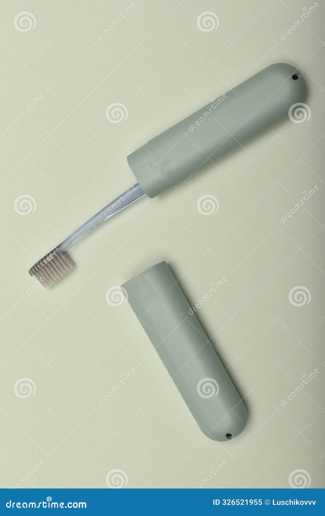A Toothbrush Case and a Toothbrush on a Green Background Stock Image ...