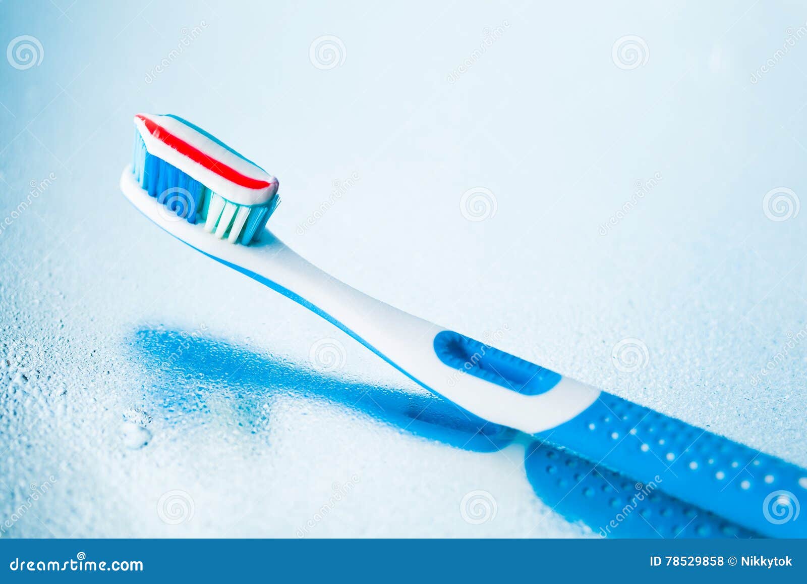 Toothbrush with Red Stripe Toothpaste Stock Photo - Image of closeup ...