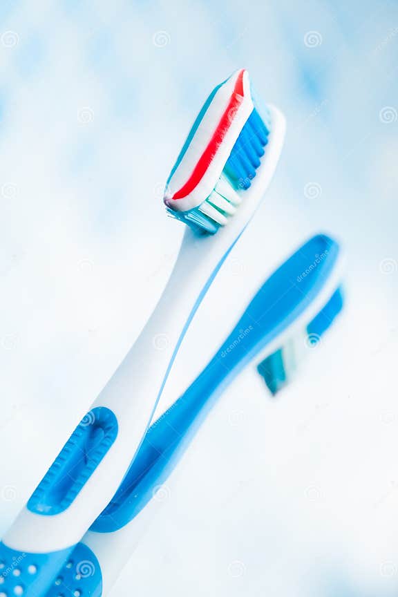 Toothbrush with Red Stripe Toothpaste and Mirror Reflection Stock Photo ...