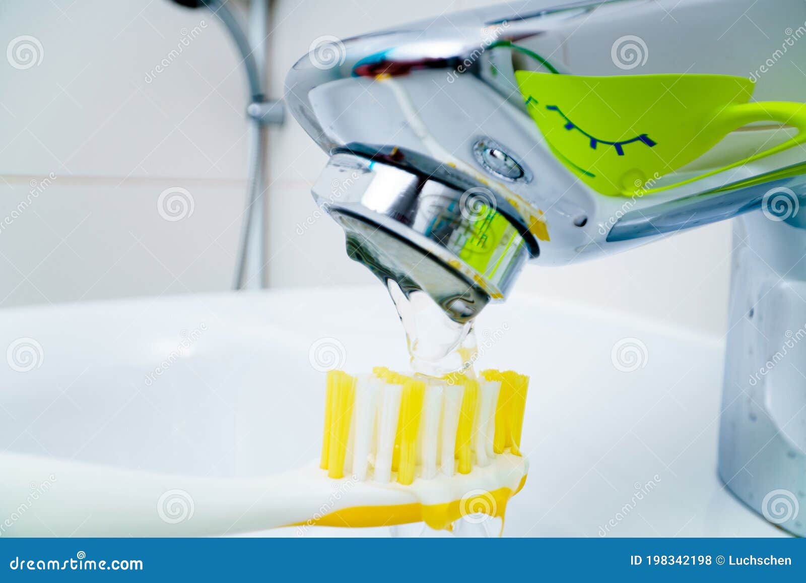 Toothbrush on the Sink in the Bathroom Stock Photo - Image of faucet ...