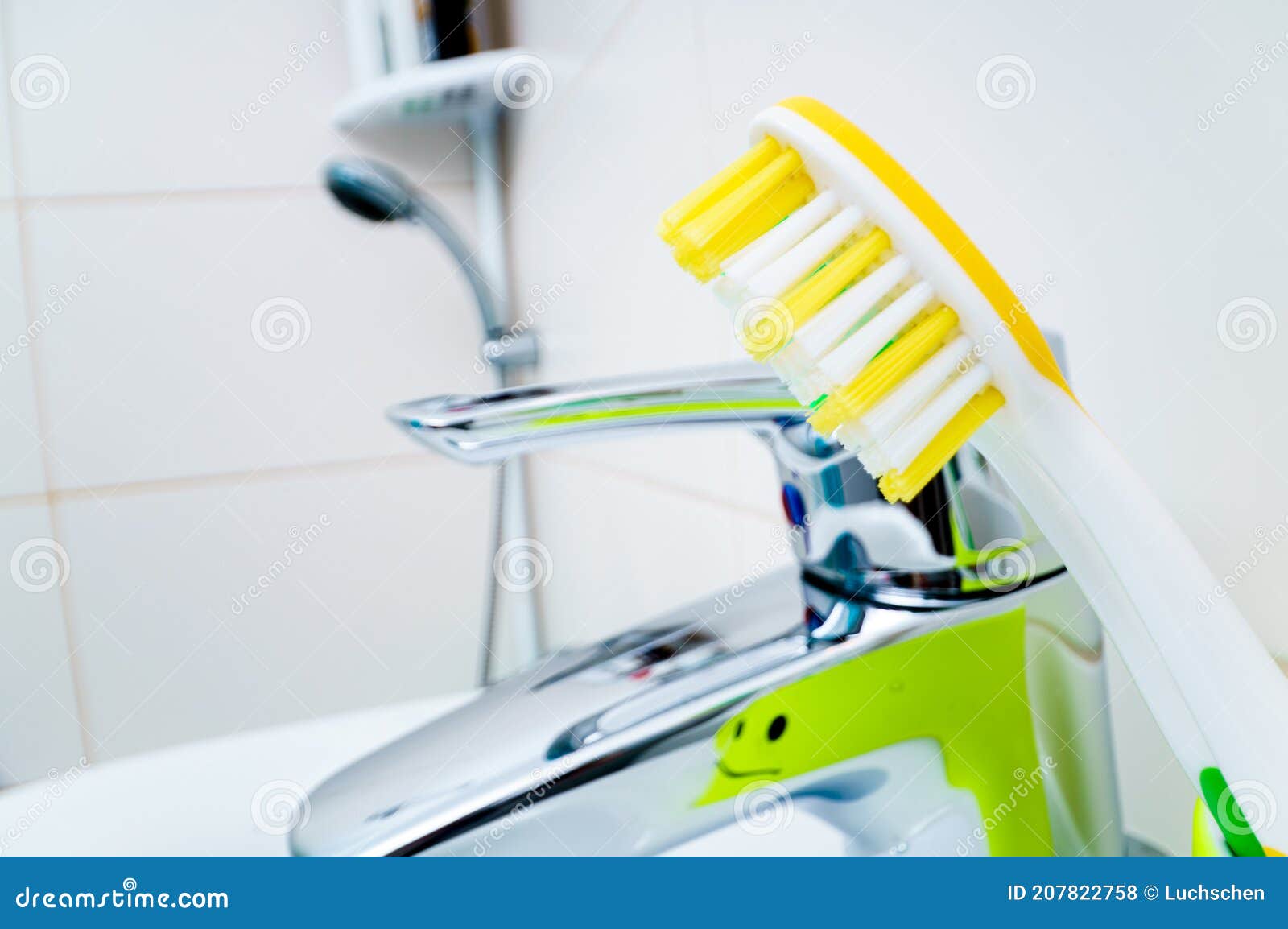 Toothbrush on the Sink in the Bathroom Stock Photo - Image of ...