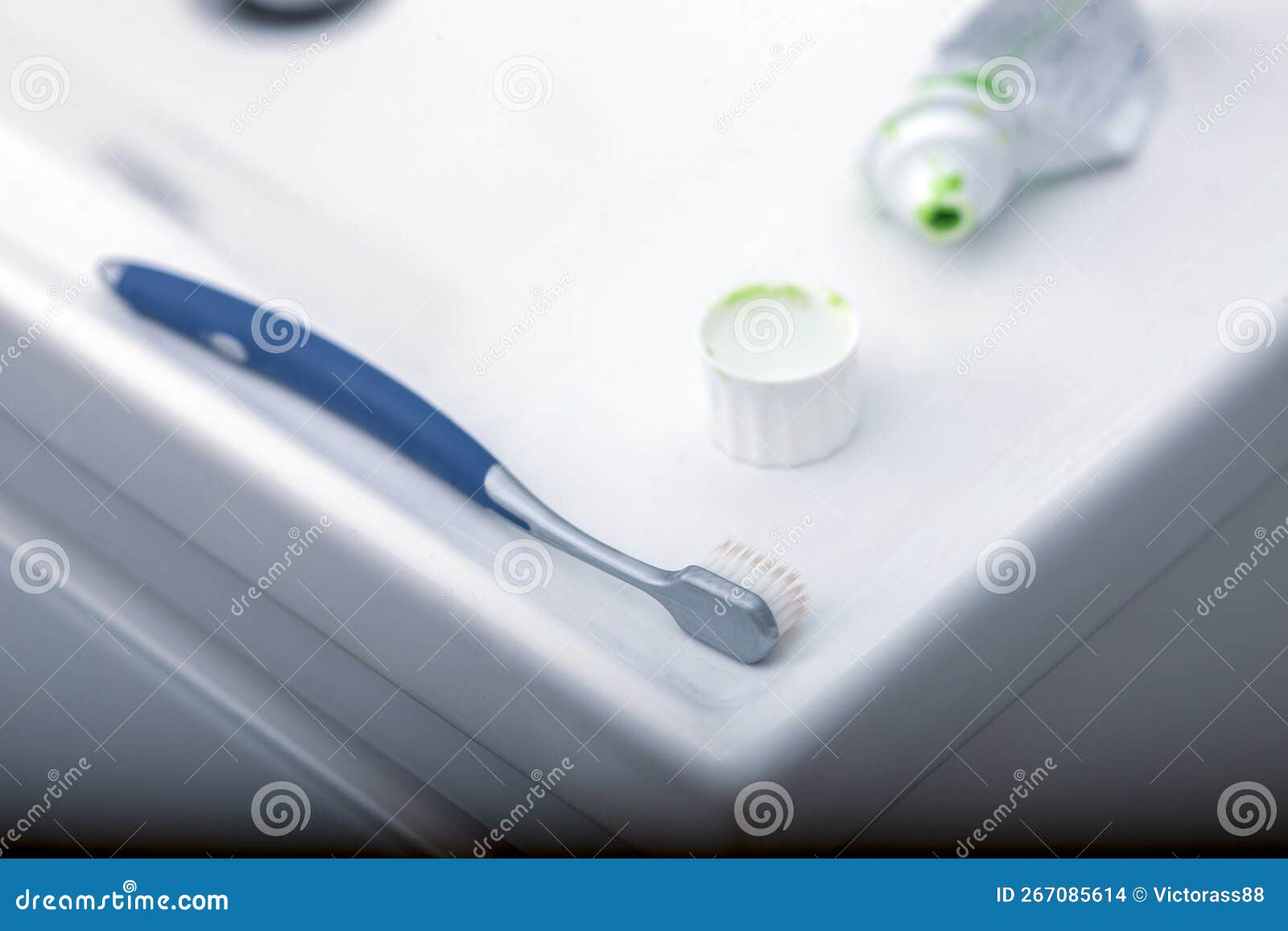Toothbrush and Squeezed Toothpaste Stock Photo - Image of sink ...