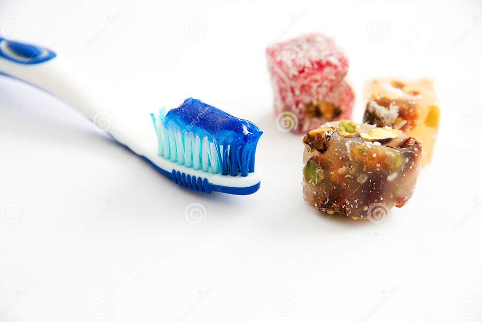 Toothbrush and sweets stock photo. Image of bathroom - 37191346
