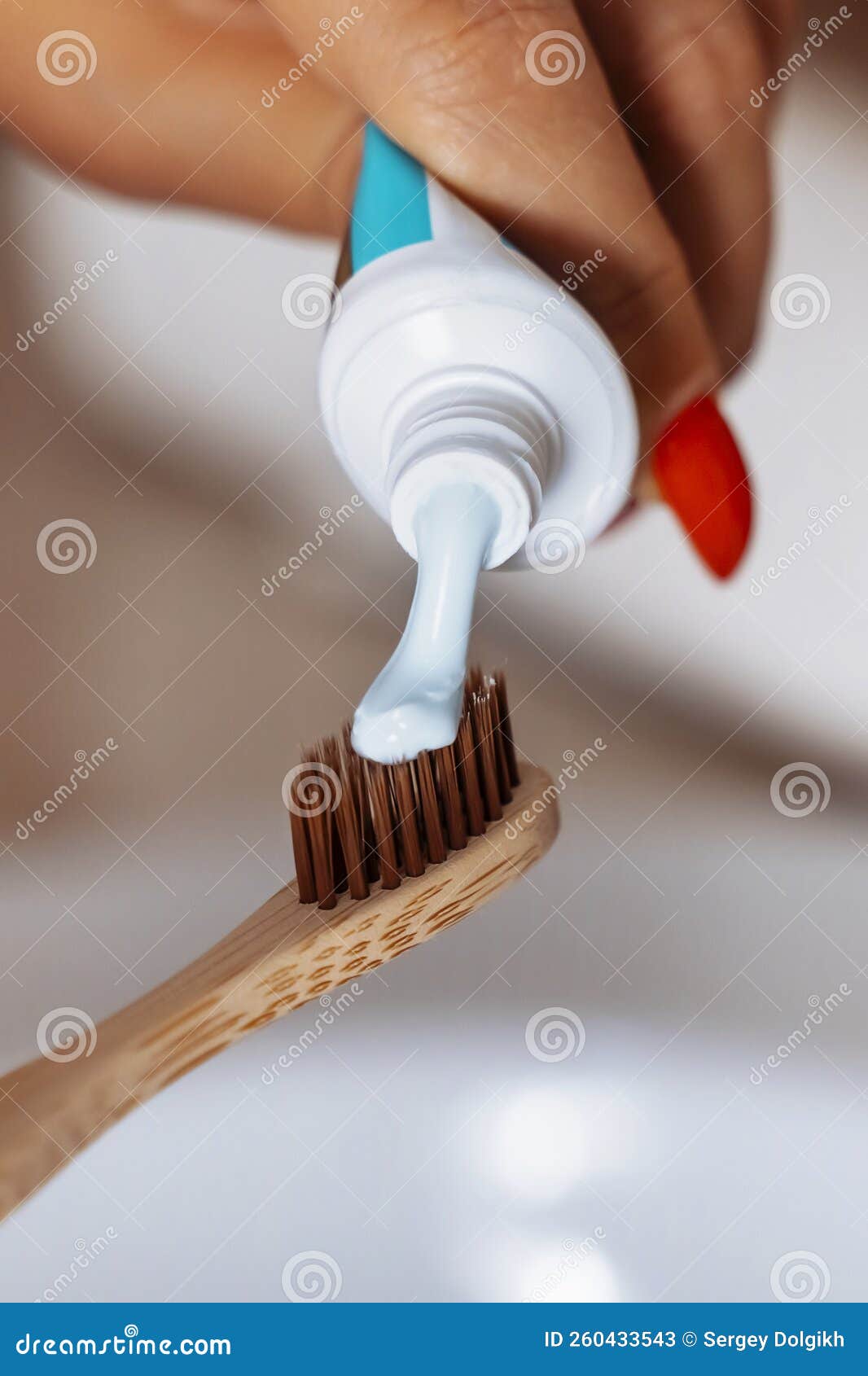 Toothbrush and Toothpaste on Blurred Background. Closeup. Wooden ...