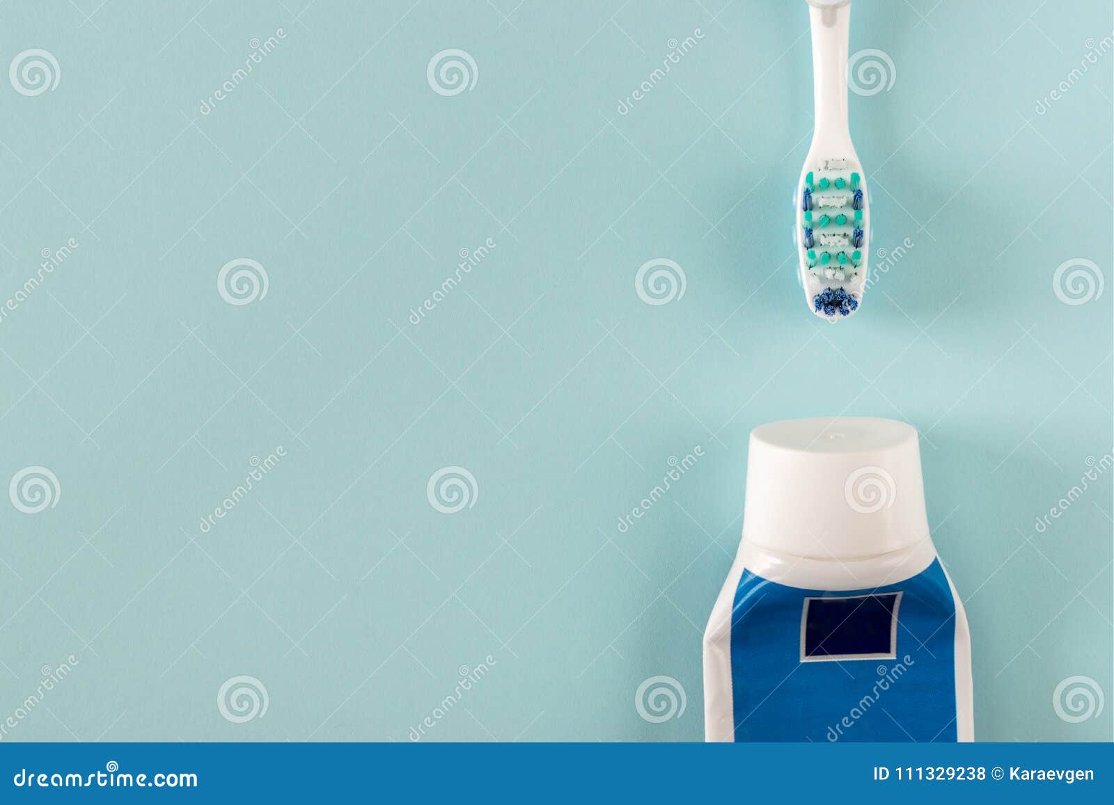Toothbrush and Toothpaste on Bright Blue Stock Photo - Image of ...