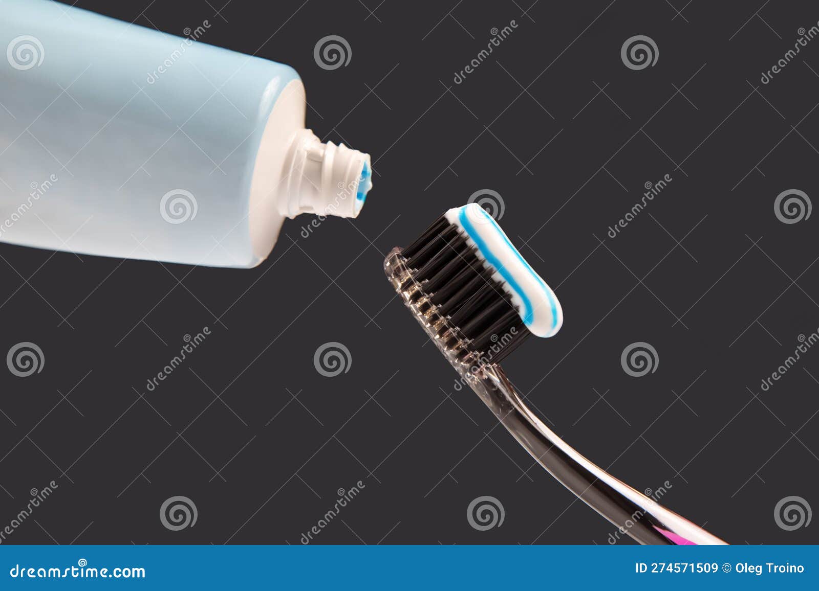 Toothbrush with Toothpaste for Cleaning Teeth on a Dark Background ...