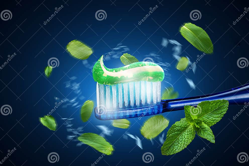 Toothbrush with Toothpaste. Mint Toothpaste. Mint Leaves Around ...