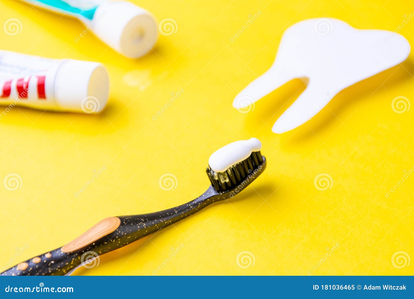 Toothbrush, Toothpaste and Paper Tooth on a Yellow Background. from ...