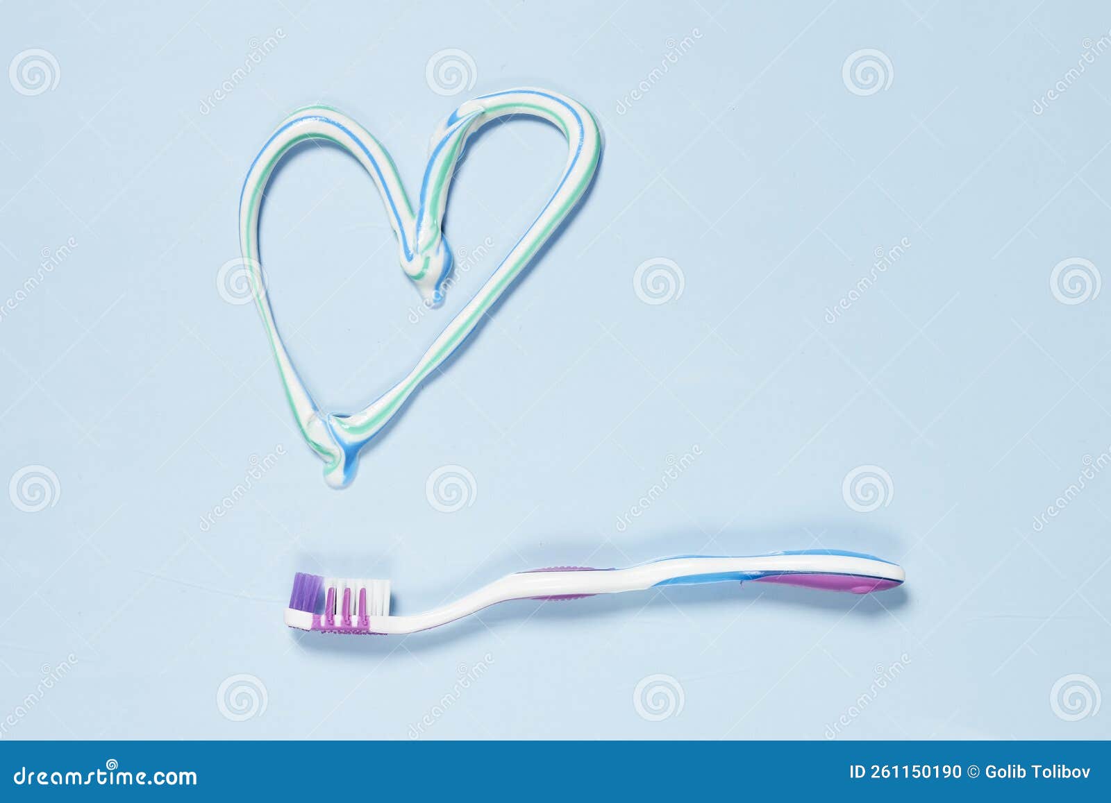 A Toothbrush with Toothpaste Shaped Like a Heart Stock Photo - Image of ...
