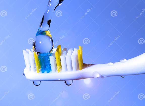 Toothbrush Under the Running Water Stock Image - Image of aqua, spray ...