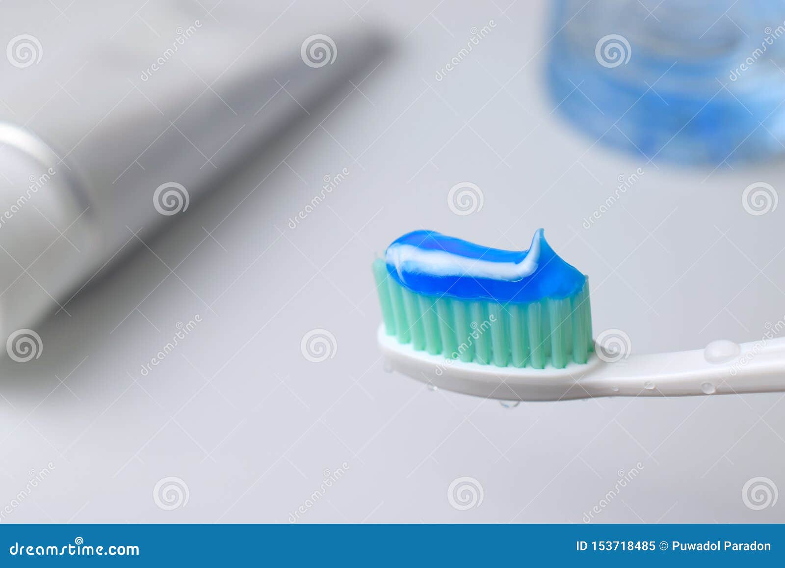 Toothbrush with Water Drop and Toothpaste on Background Stock Image ...