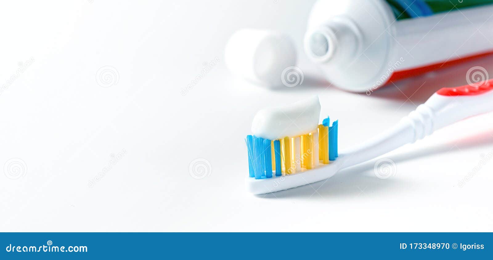 Toothbrush with White Toothpaste and Tube of Toothpaste on White ...