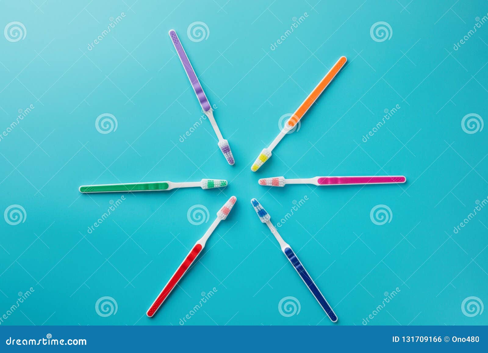 Toothbrushes in the Form of a Star on a Blue Background Stock Photo ...