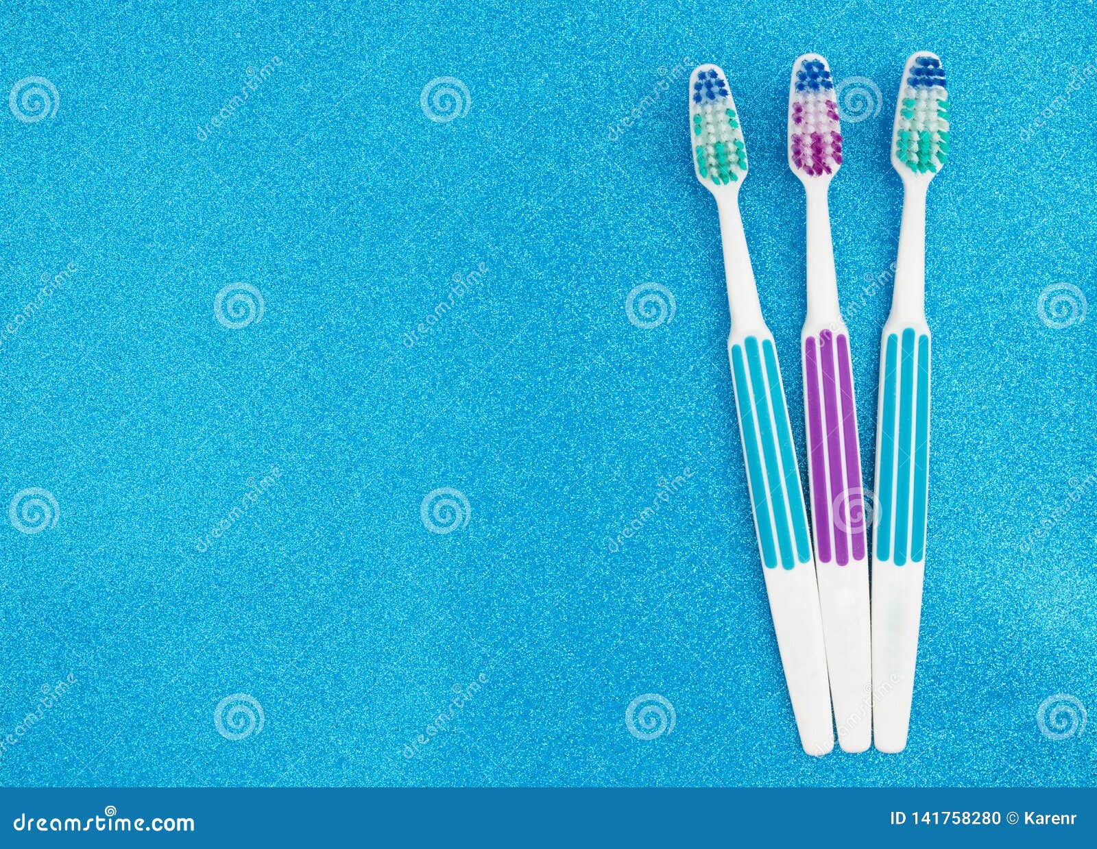 Toothbrushes on a Blue Glitter Background Stock Photo - Image of border ...
