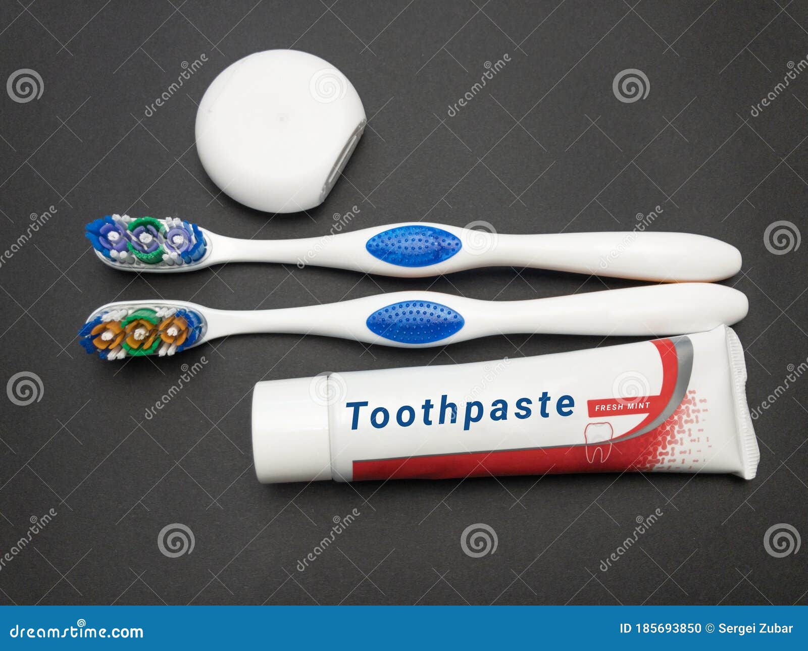 Toothbrushes, Floss and Toothpaste Isolated on Black Background ...