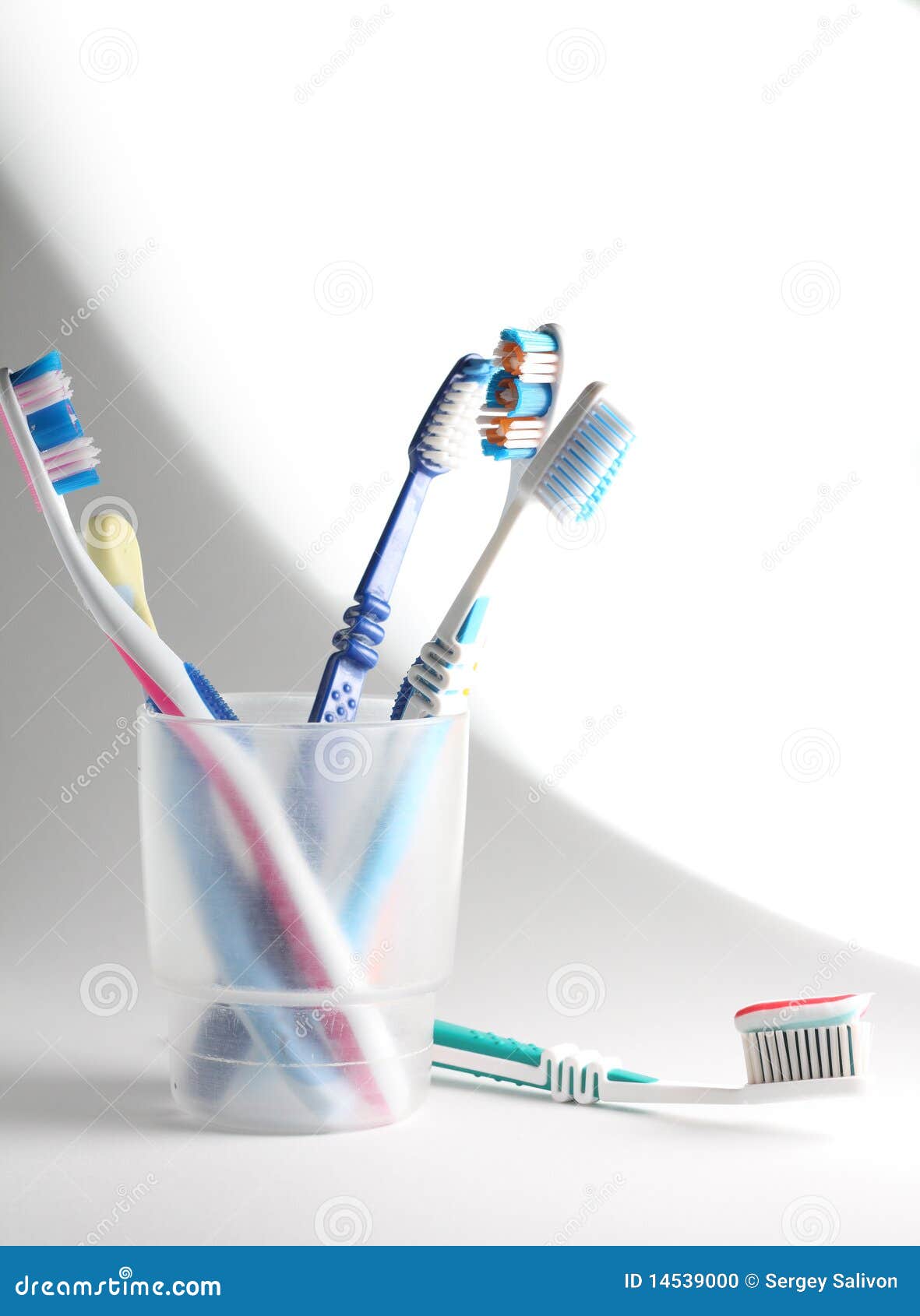 Toothbrushes in a glass stock photo. Image of color, white - 14539000