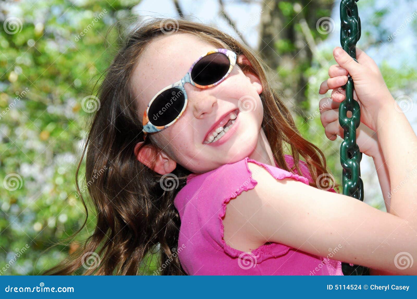 Toothless Girl on Swing stock photo. Image of funny, humorous - 5114524