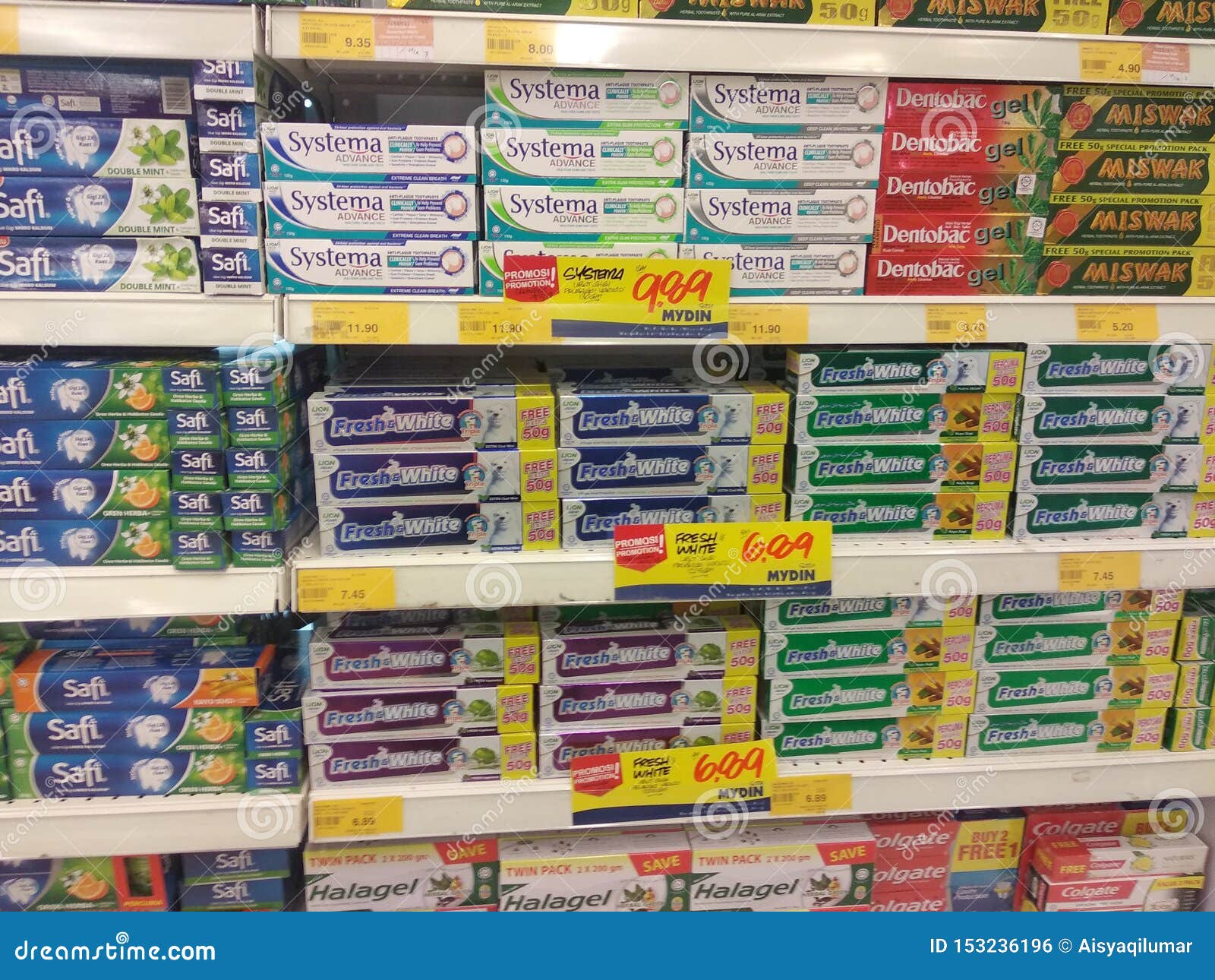 The Toothpaste is in the Box and is Displayed on the Shelf by Brand and ...