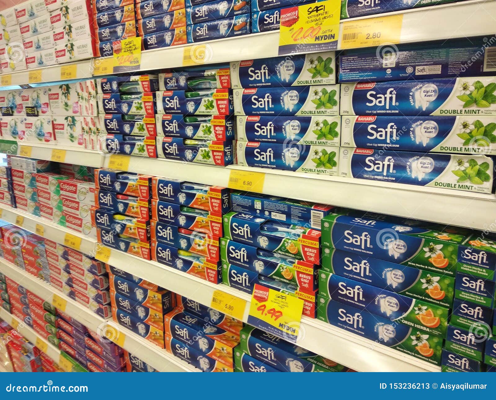 The Toothpaste is in the Box and is Displayed on the Shelf by Brand and ...