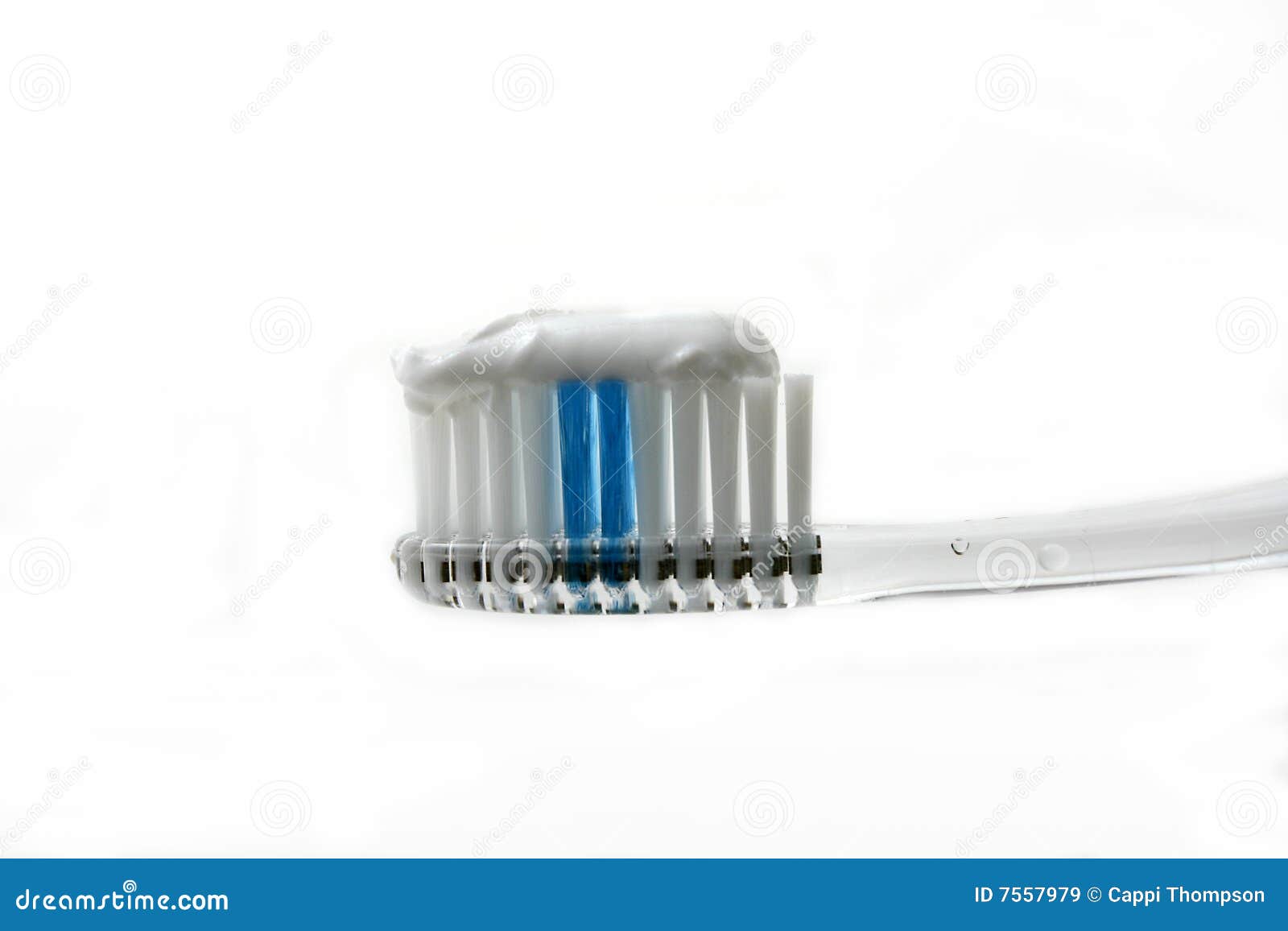Toothpaste on a toothbrush stock image. Image of paste - 7557979