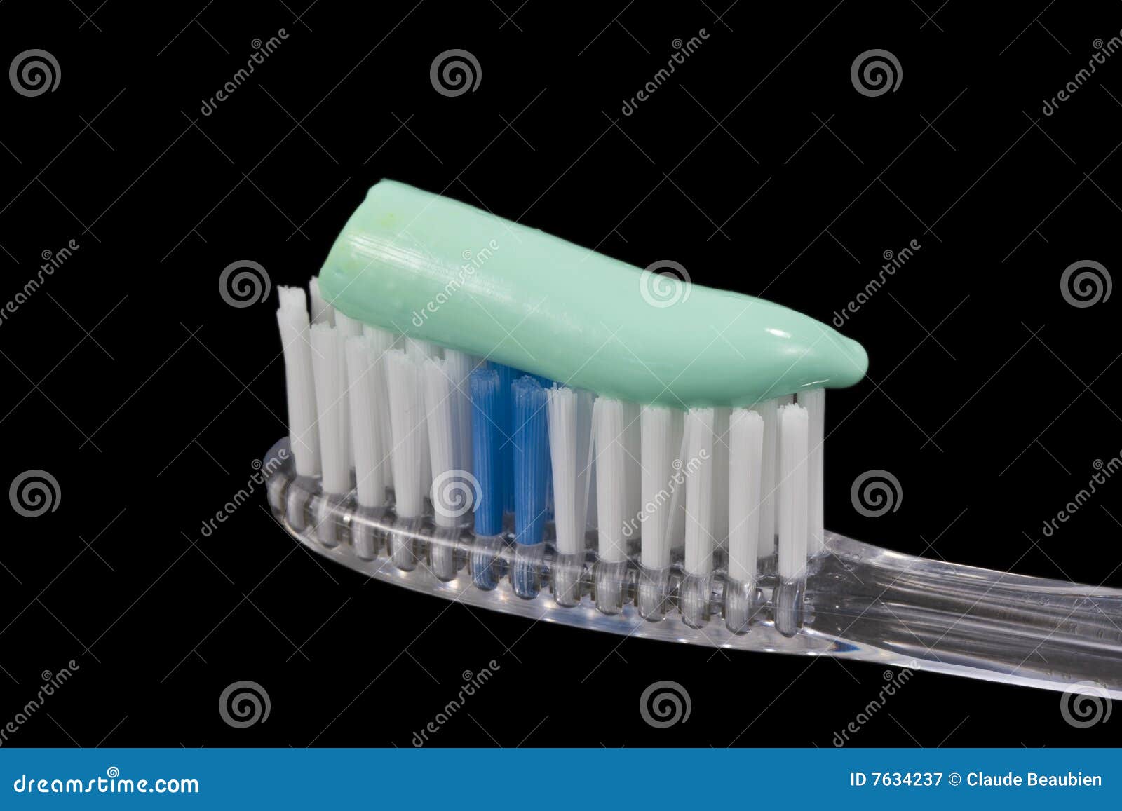 Toothpaste on a Toothbrush stock image. Image of clean - 7634237