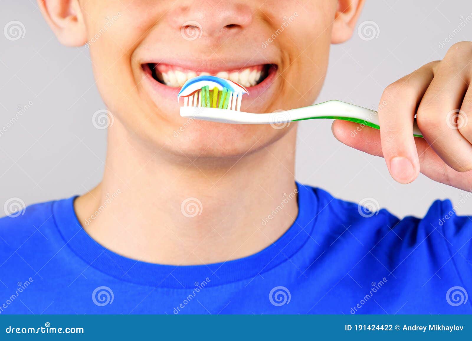 Toothpaste Toothbrush on the Background of a Smiling Face. Isolated ...