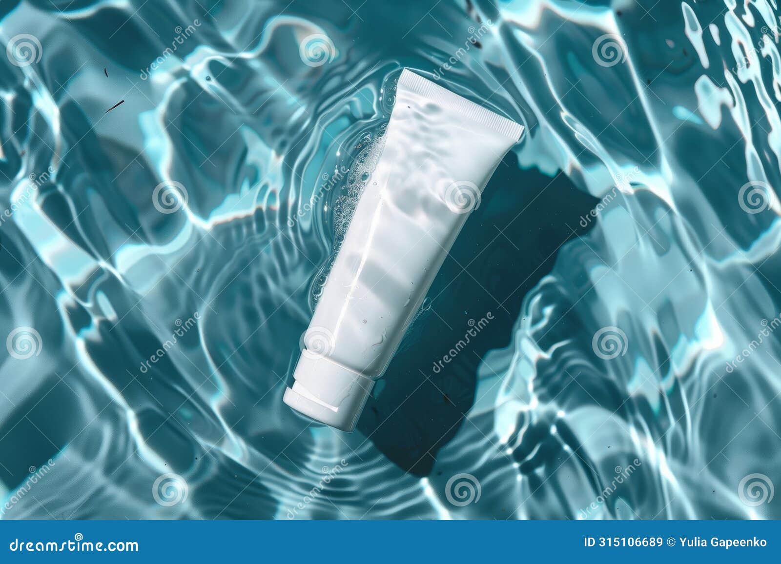Toothpaste Tube Floating in Pool of Water Stock Image - Image of object ...