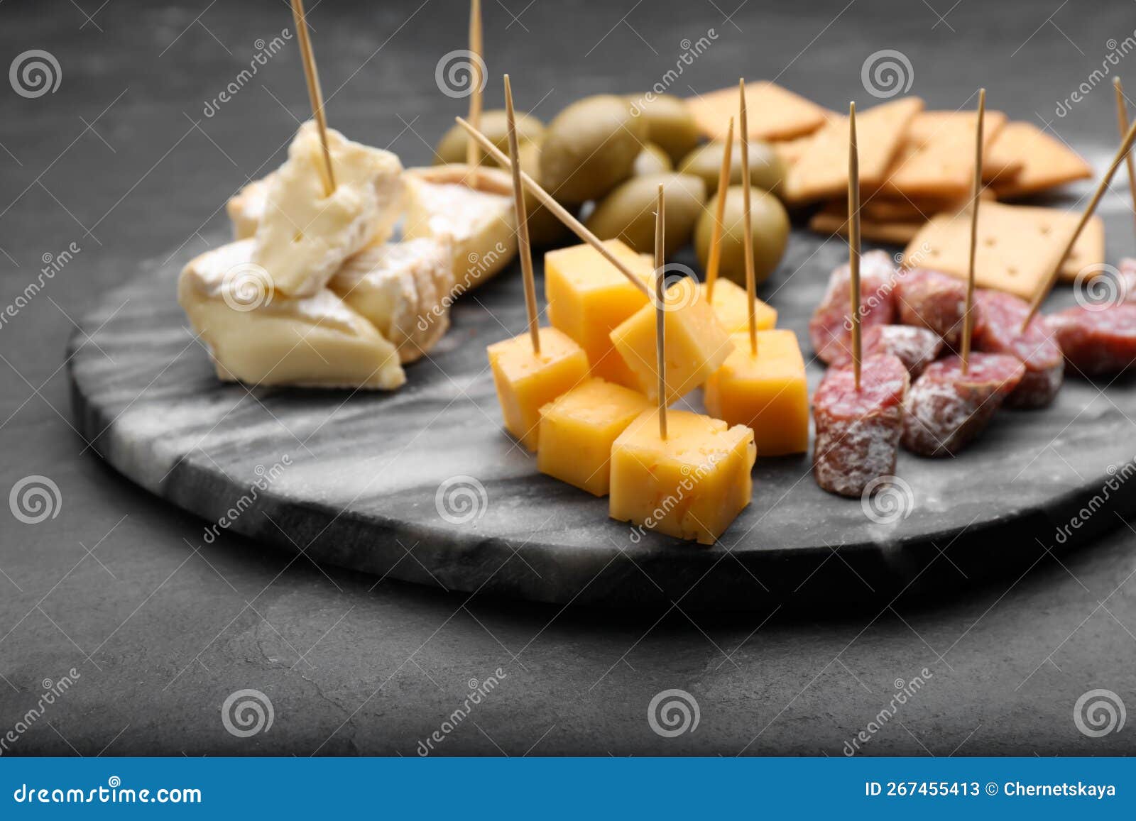 Toothpick Appetizers. Pieces of Cheese and Sausage on Black Table ...