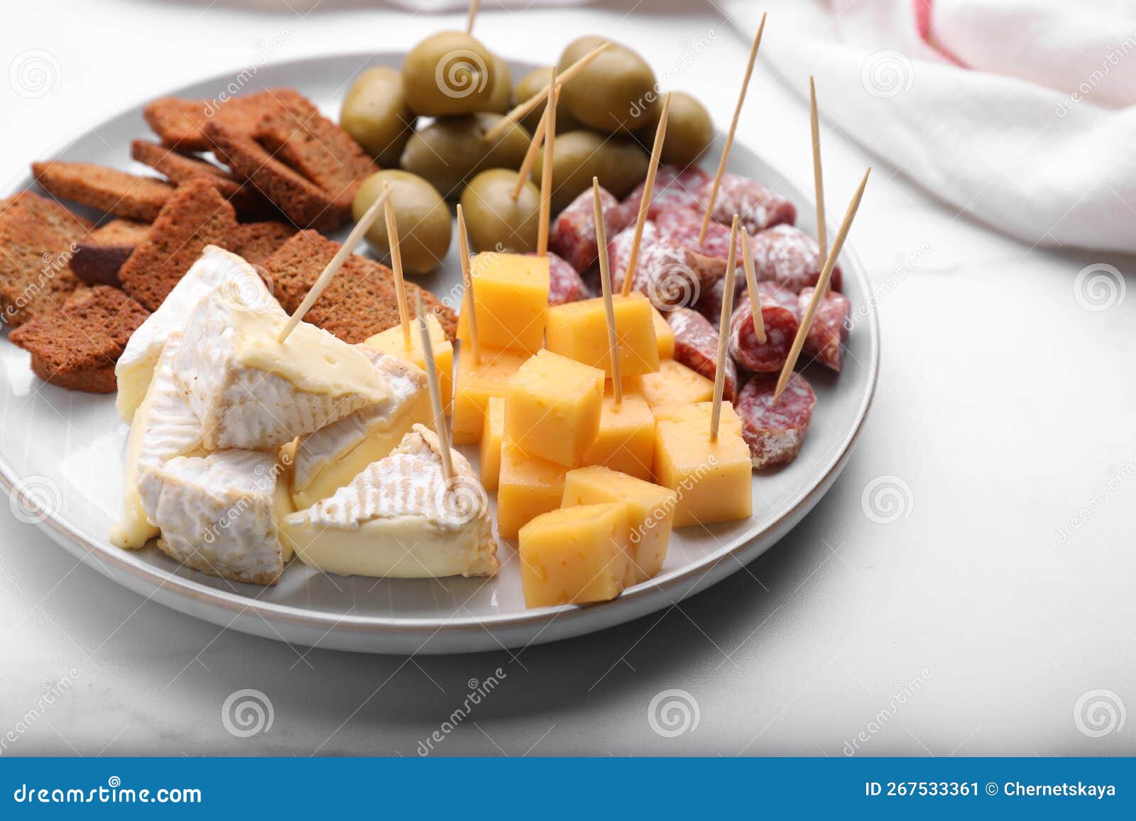 Toothpick Appetizers. Pieces of Different Cheese, Sausage and Olives on ...