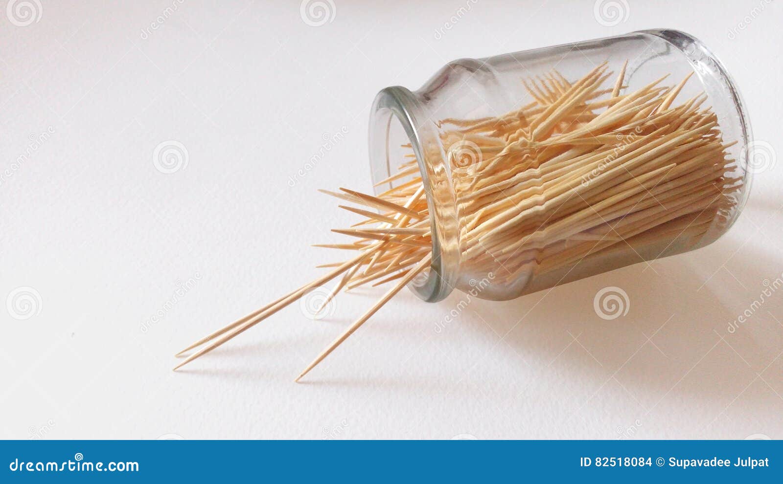 Bottle With Toothpicks On A White Background. The Toothpick Falls ...