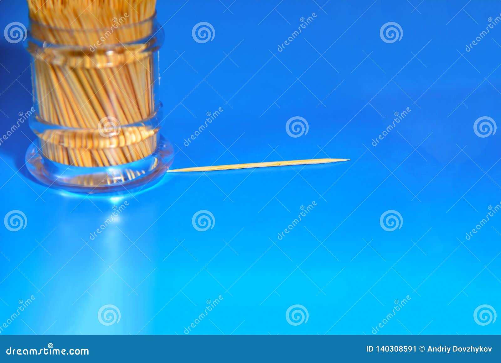 Toothpicks in Plastic Containers on a Blue Background Stock Image ...