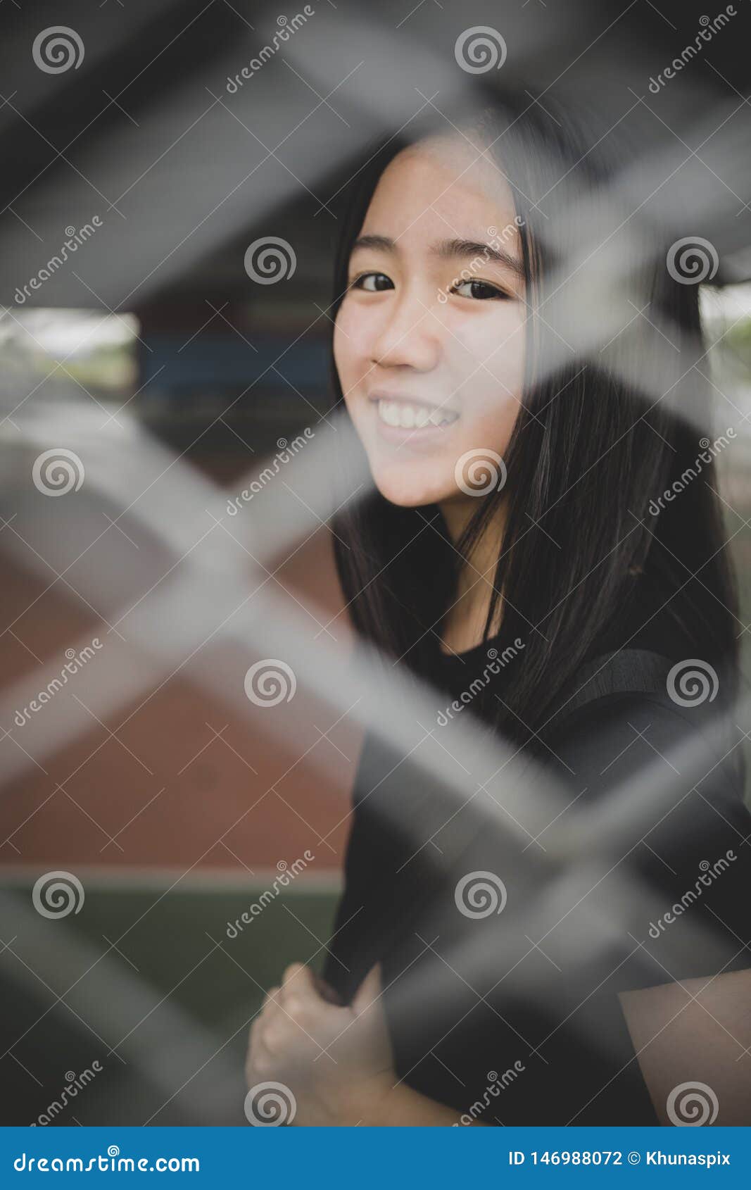 Toothy Smiling Face of Asian Teenager Relaxing Emotion Stock Photo ... Toothy Smiling Face of Asian Teenager Relaxing Emotion Stock Photo ...