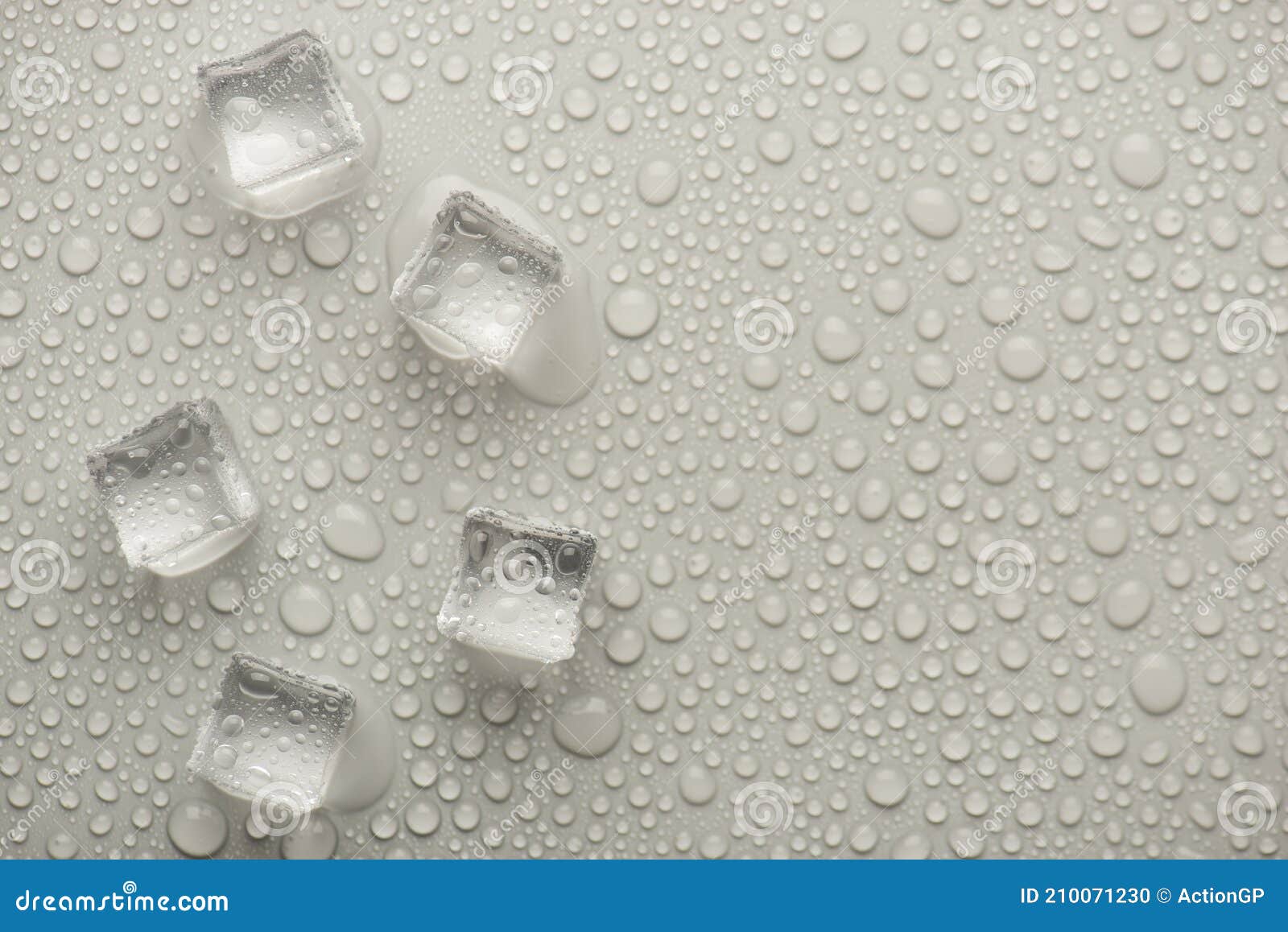 Top Above Overhead View Photo of Ice Cubes on Grey Backdrop with Drops ...