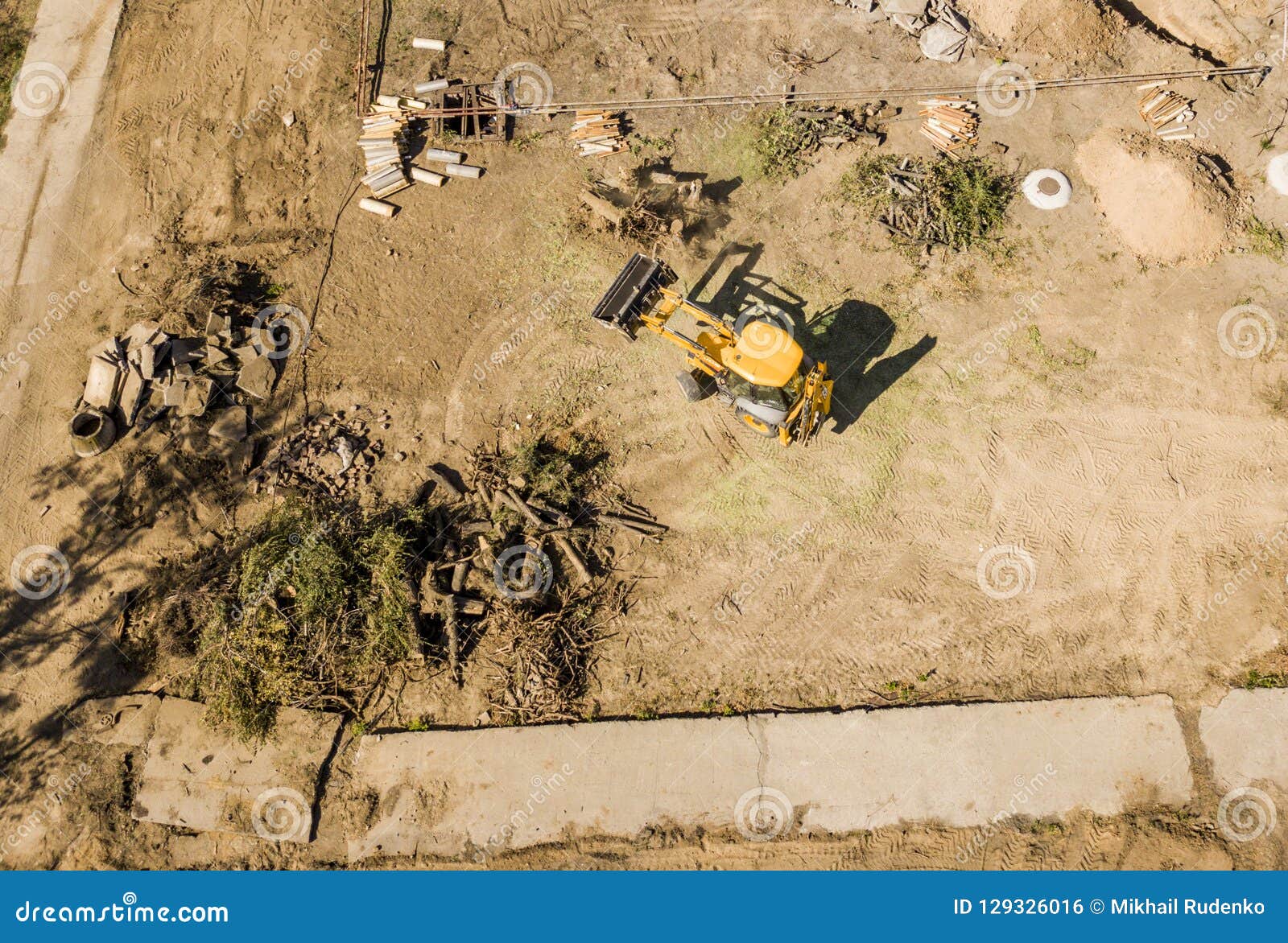 Top Aerial View of Big Wheel Loader Excavator Bulldozer Work on a ...
