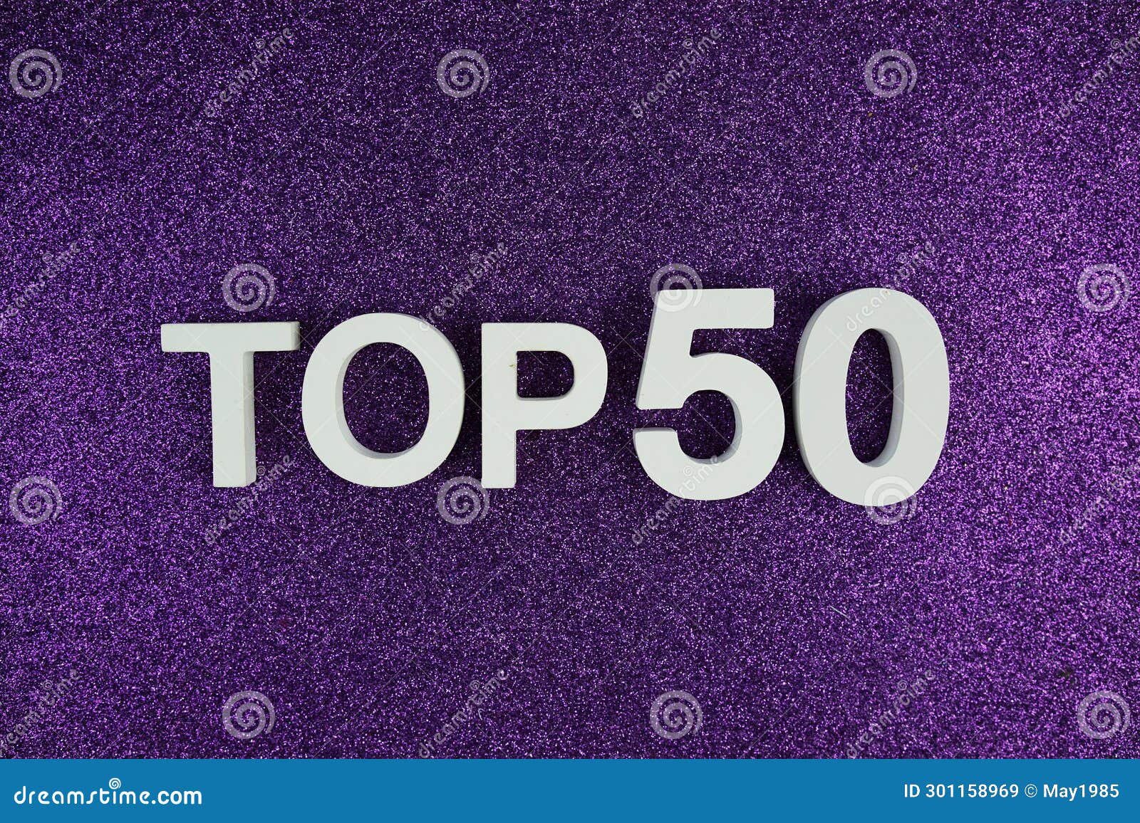 Top 50 Alphabet Letters Top View on Purple Glitter Background Stock ...